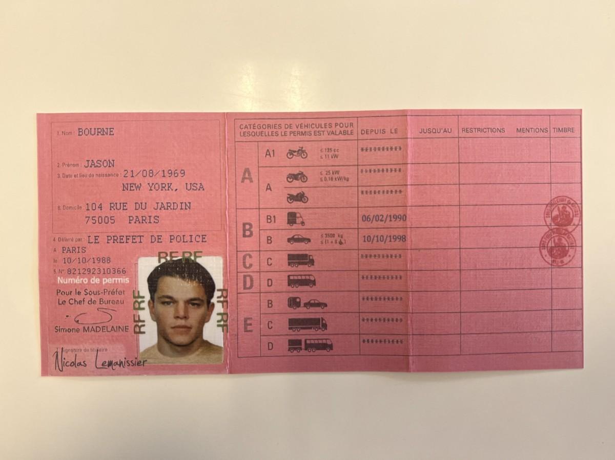 The Bourne Supremacy Matt Damon film passport prop | EstateSales.org