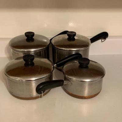 LOT 32: Revere Ware Pots w/Lids & More | EstateSales.org