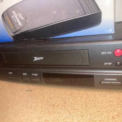 ZENITH VCR , VHS STORAGE RACK, AND VIDEO REWINDER | EstateSales.org