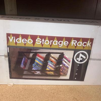 ZENITH VCR , VHS STORAGE RACK, AND VIDEO REWINDER | EstateSales.org