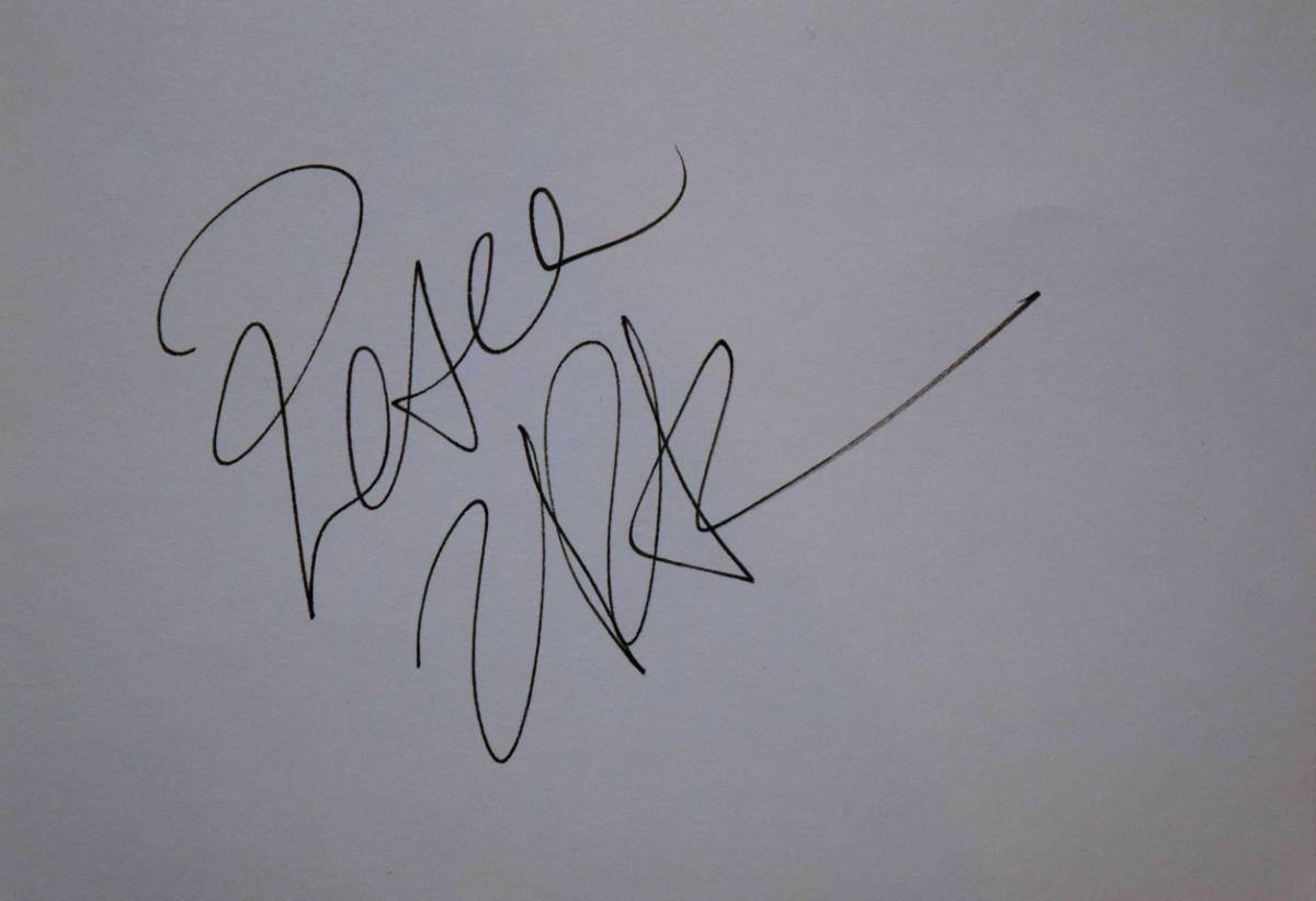 Tupac Shakur signed slip | EstateSales.org