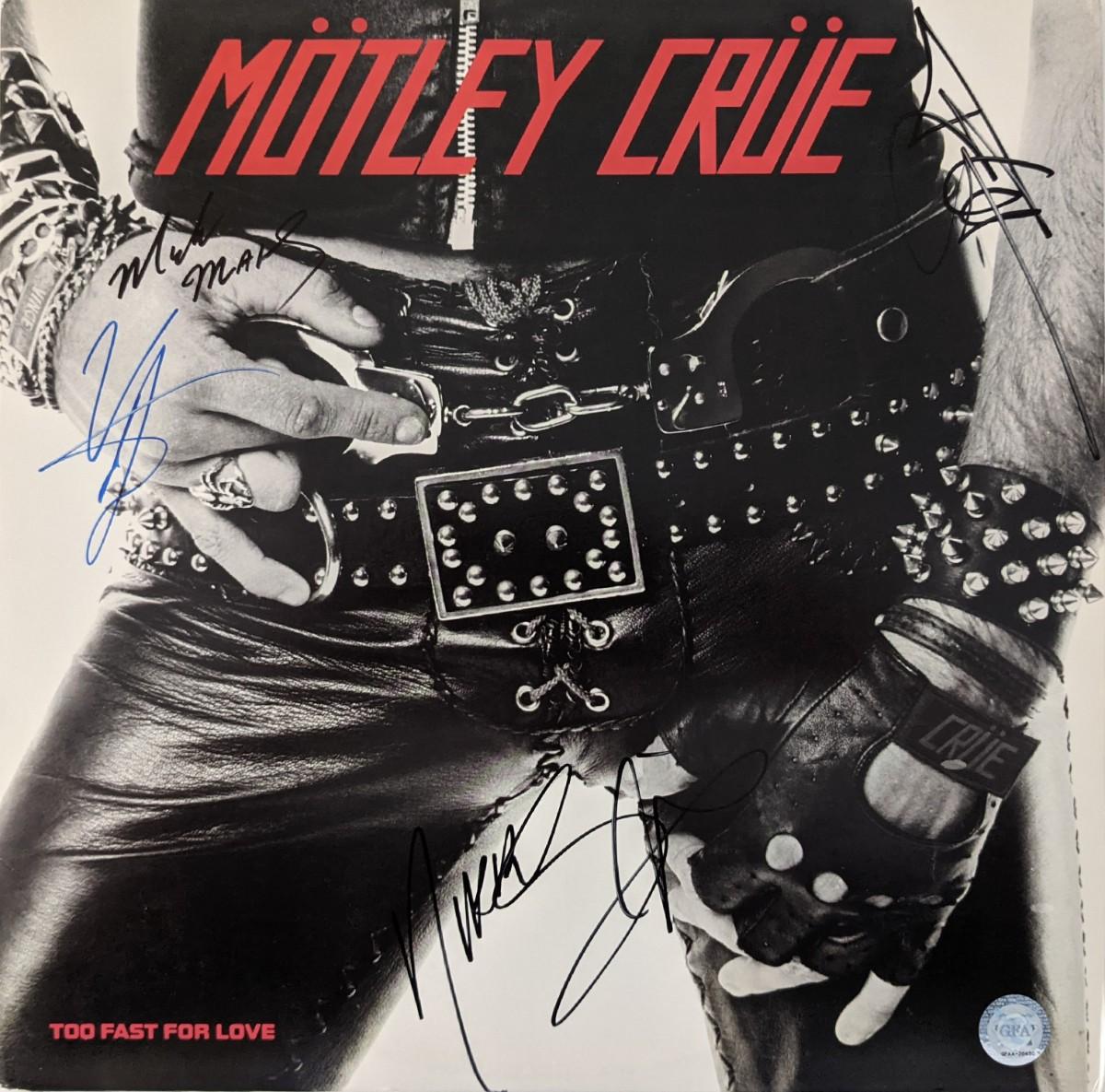 Motley Crue Too Fast For Love Signed Album | EstateSales.org