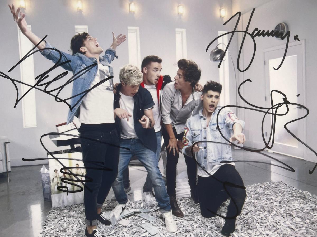 One Direction band signed photo | EstateSales.org