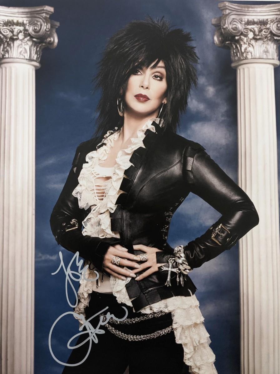 Cher signed magazine page | EstateSales.org
