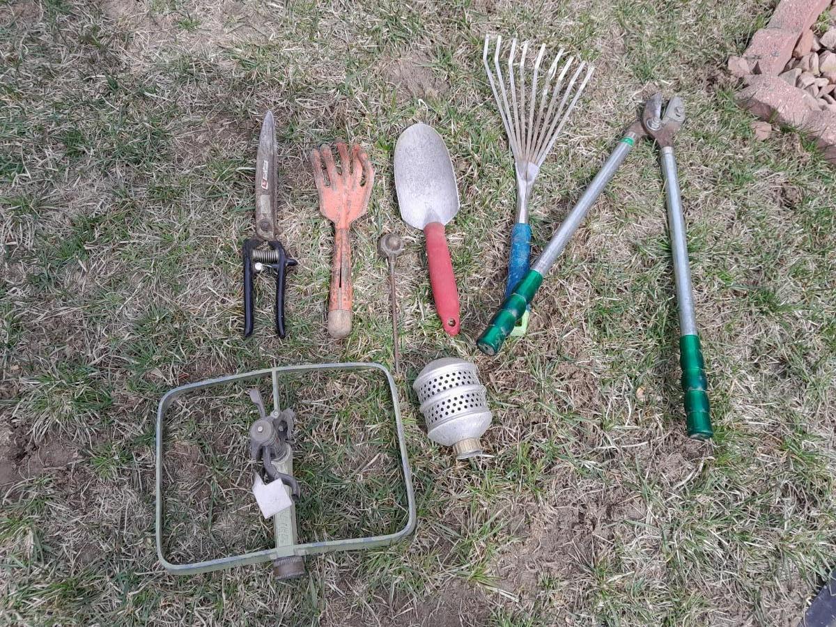 Hand-held garden / flowerbed tools and steel framed rain bird sprinkler ...