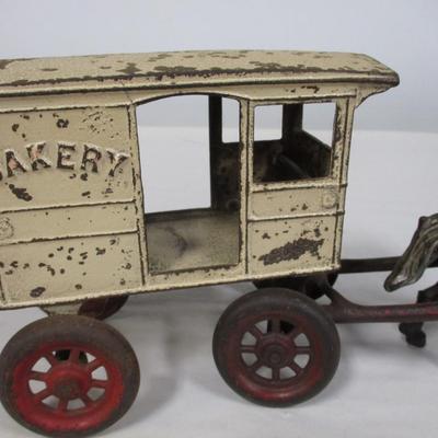 Vintage Kenton Cast Iron Horse Drawn Bakery Wagon | EstateSales.org