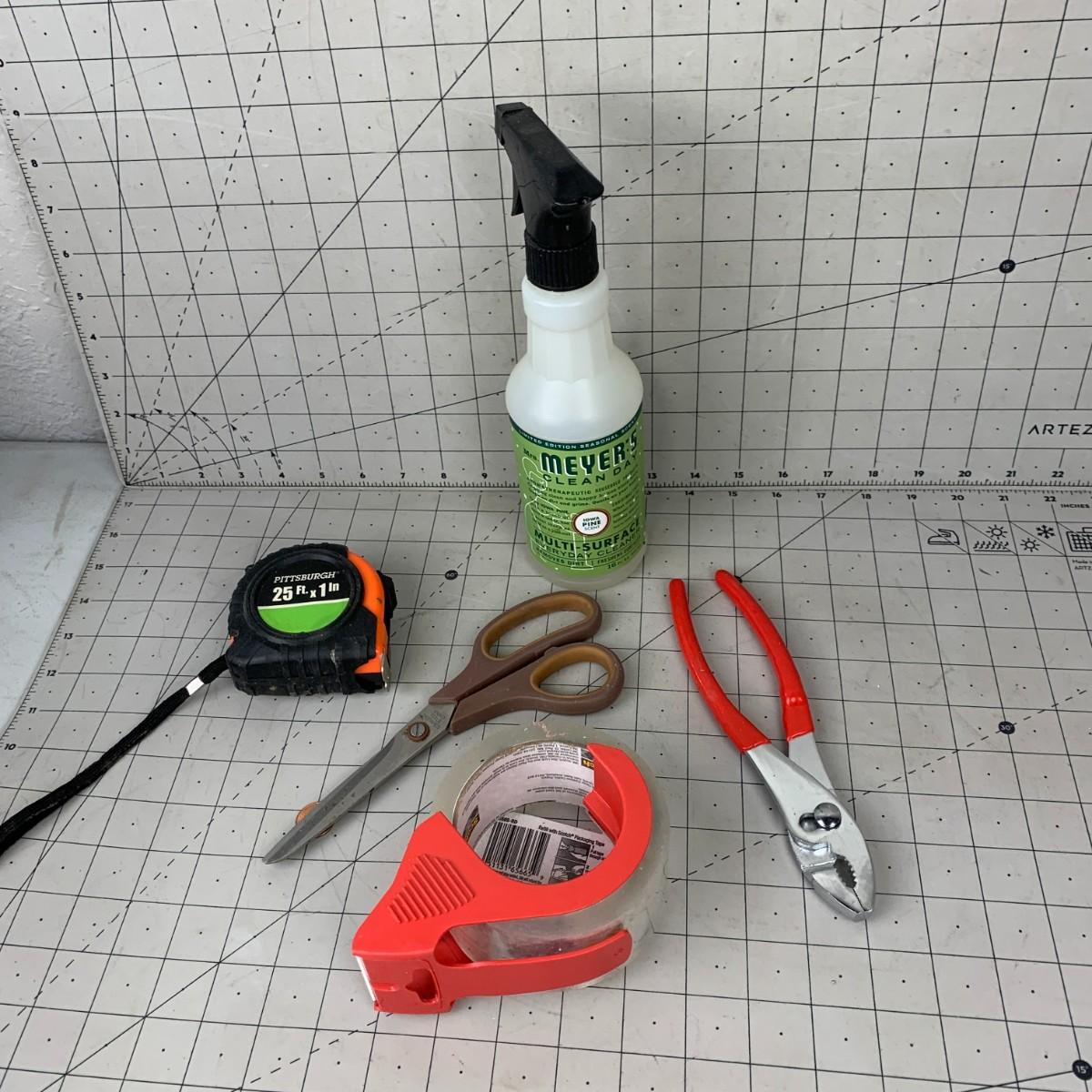 #267 Meyers Spray, Measuring Tape, Scissors and Tape | EstateSales.org