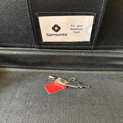 SAMSONITE BRIEFCASE WITH KEYS AND A DUFFLE BAG | EstateSales.org