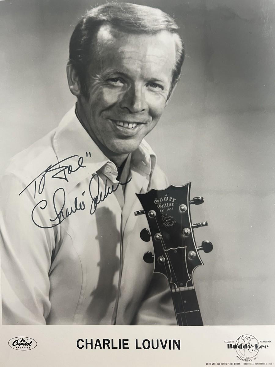 Rock Band LOVE signed Electra Records Advertisement | EstateSales.org