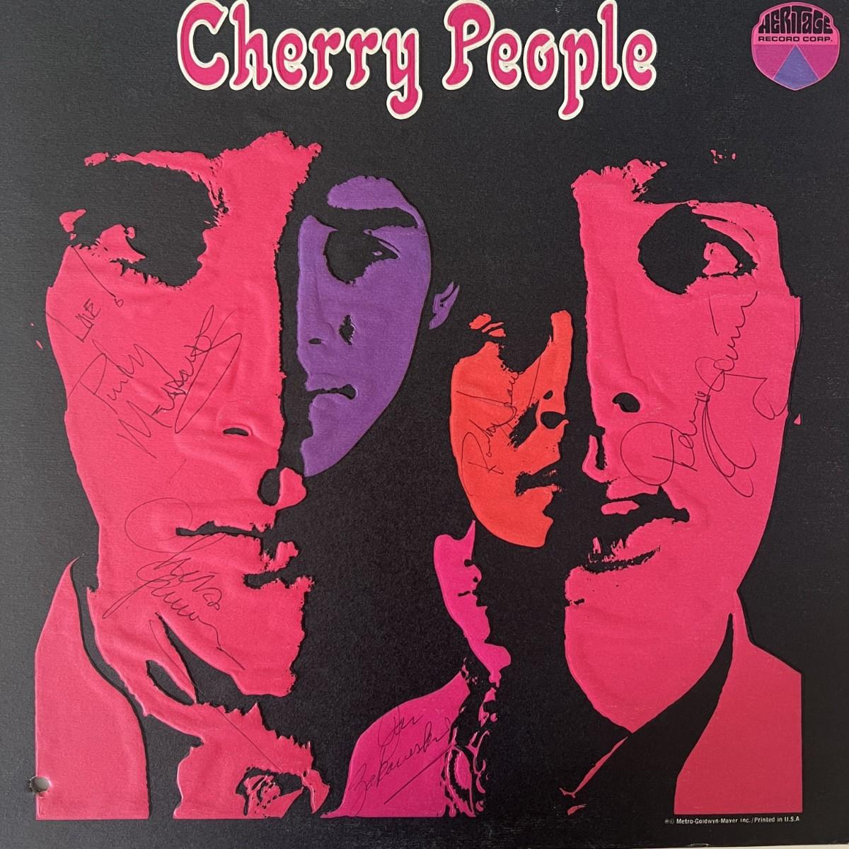 Cherry People signed album | EstateSales.org