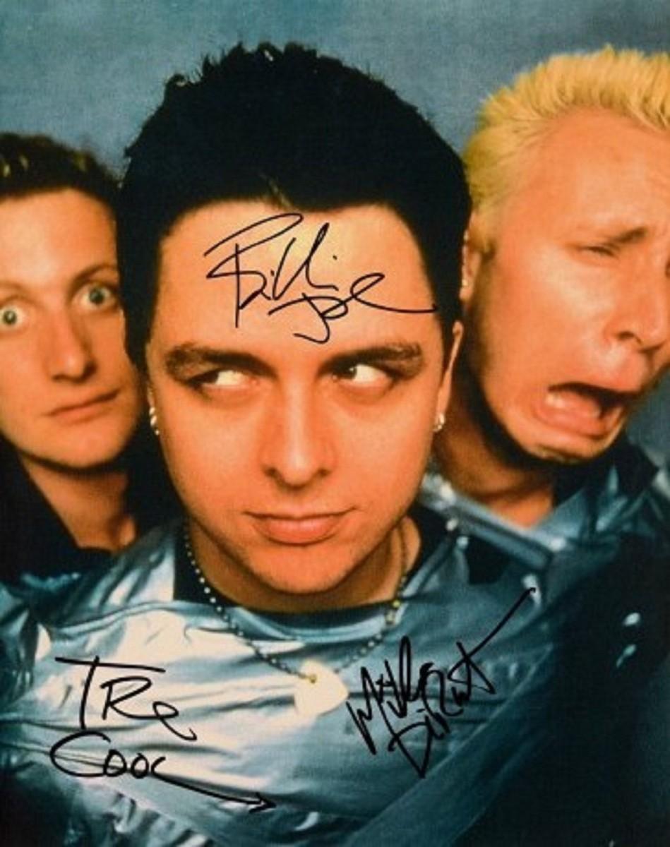 Green Day signed promo photo | EstateSales.org