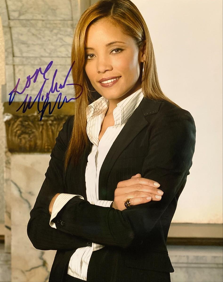 Michael Michele signed photo | EstateSales.org