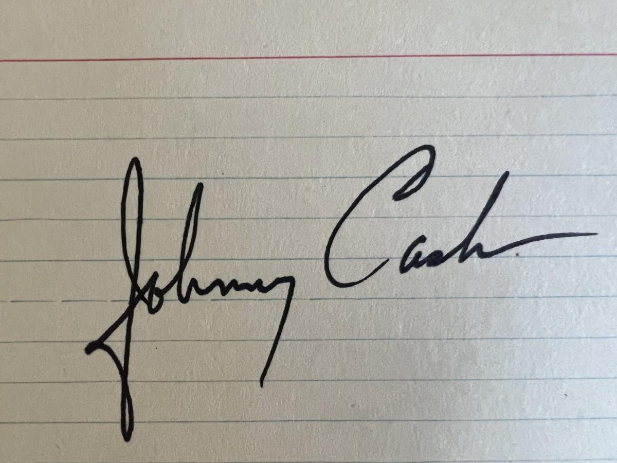 Johnny Cash signature. | EstateSales.org