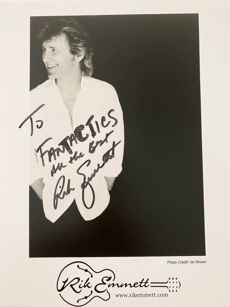 Triumph Rik Emmett signed photo | EstateSales.org