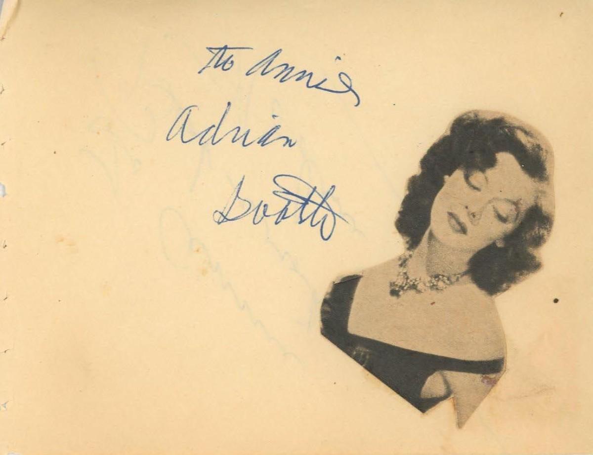 Adrian Booth signed photo clipping | EstateSales.org