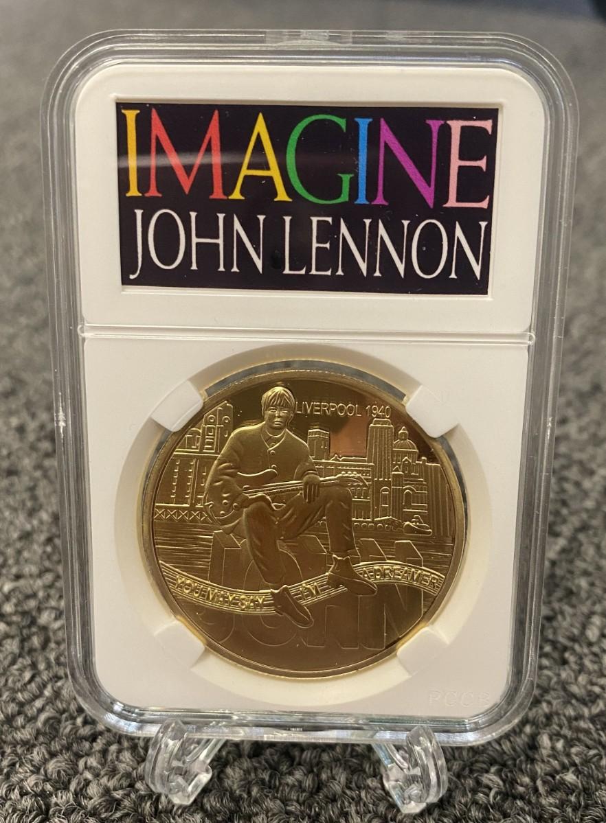 Imagine John Lennon commemorative coin | EstateSales.org