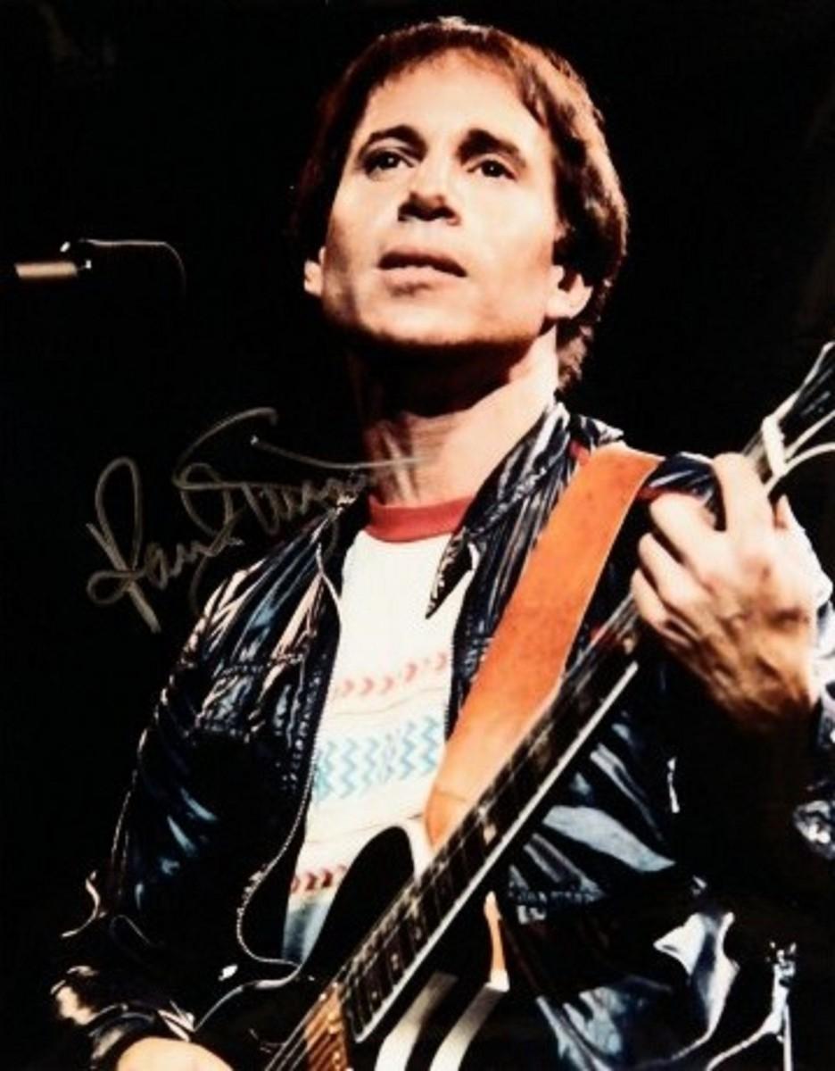 Paul Simon signed promo photo | EstateSales.org