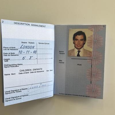 James Bond Roger Moore film passport prop | EstateSales.org