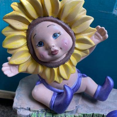 Ceramic sunflower kids | EstateSales.org