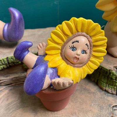 Ceramic sunflower kids | EstateSales.org