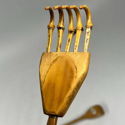 Pair of Vintage Wooden Back Scratchers | EstateSales.org