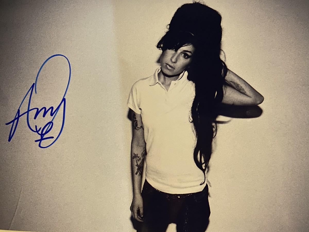 Amy Winehouse signed photo. 8x10 inches. GFA authenticated ...
