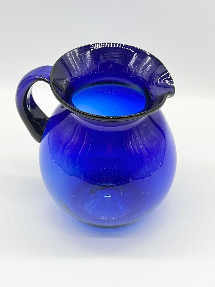 Hand blown Cobalt Blue Pitcher | EstateSales.org Hand blown Cobalt Blue Pitcher | EstateSales.org