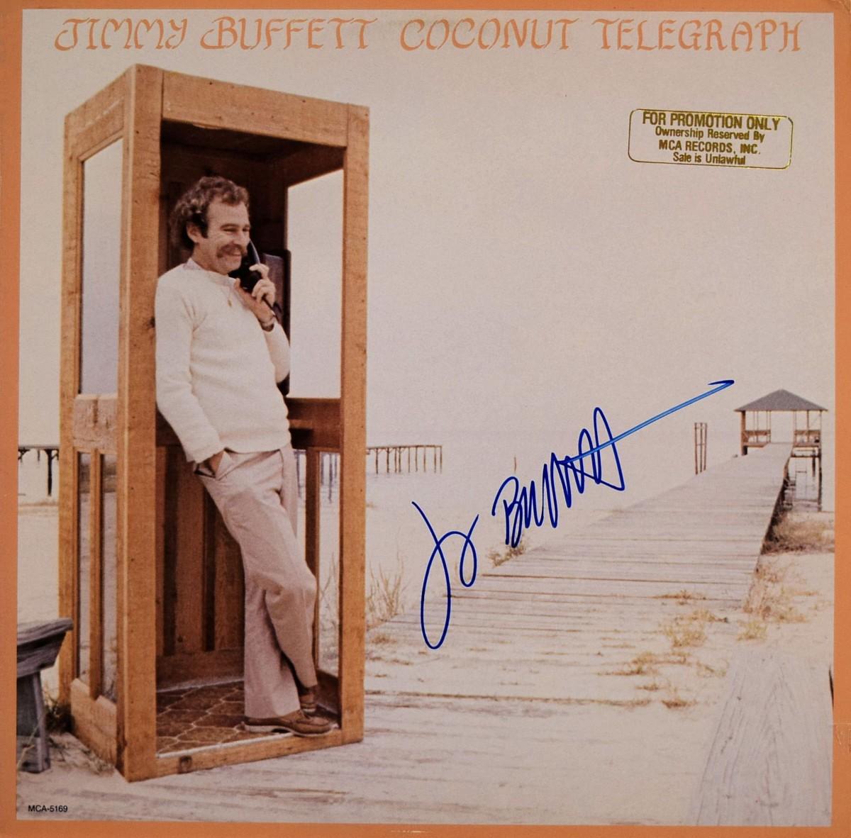 Jimmy Buffett signed Coconut Telegraph album | EstateSales.org