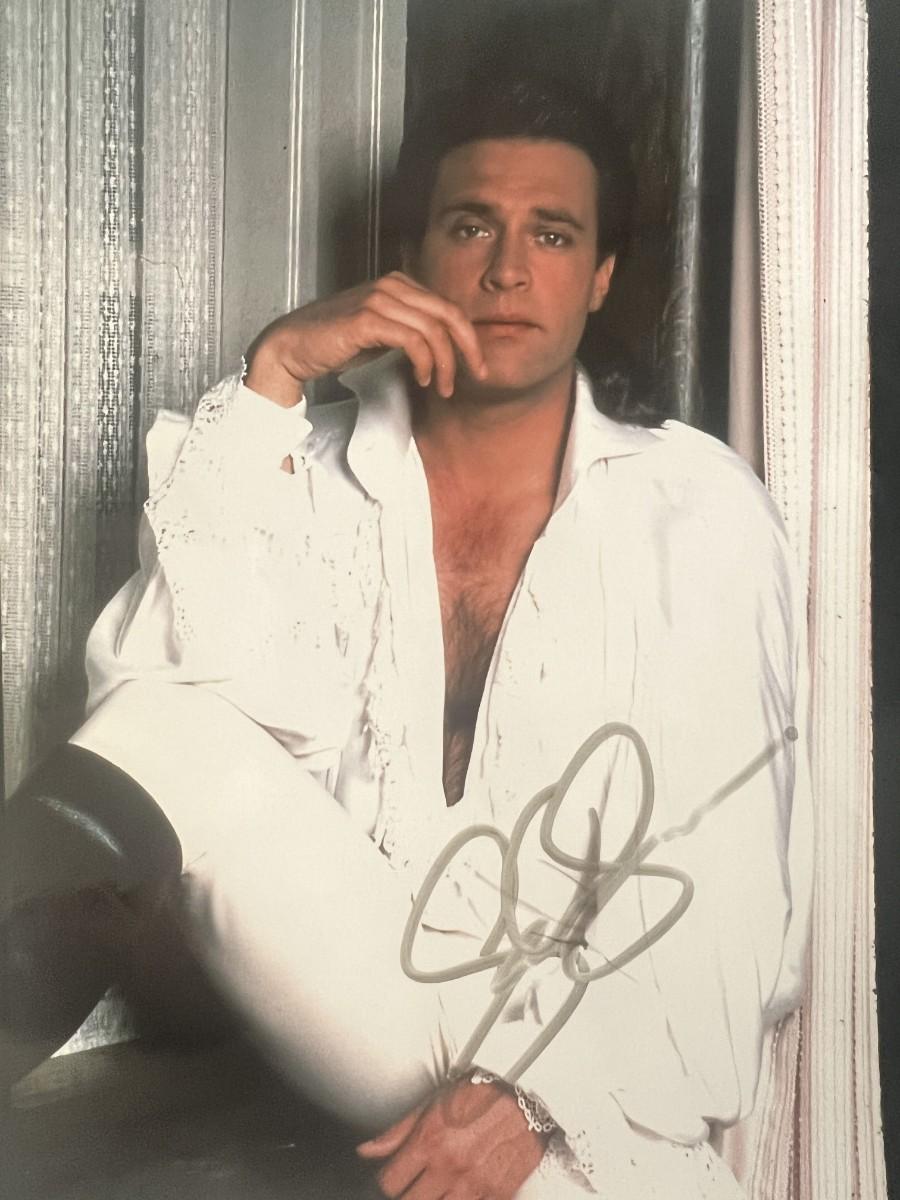 Dynasty John James signed photo | EstateSales.org