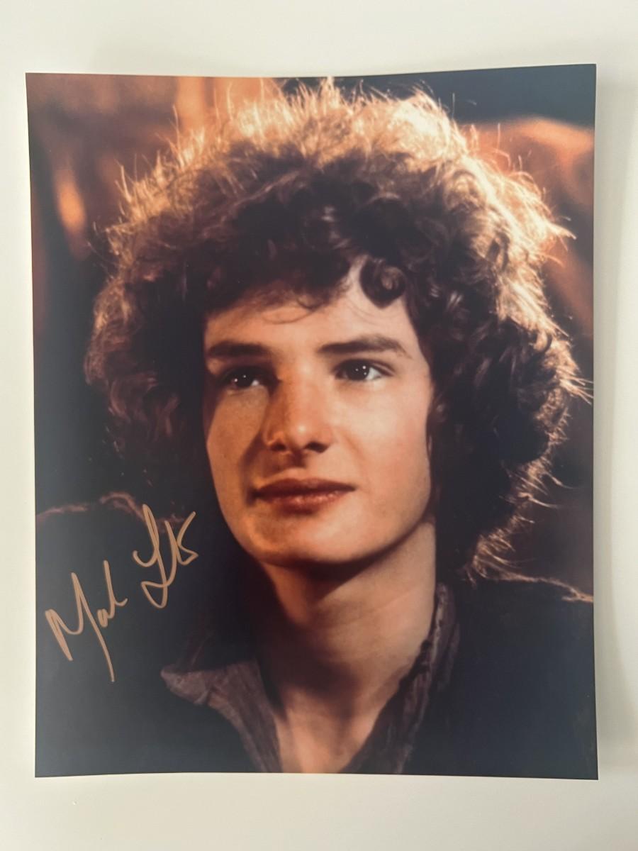 Crossed Swords Mark Lester signed movie photo | EstateSales.org