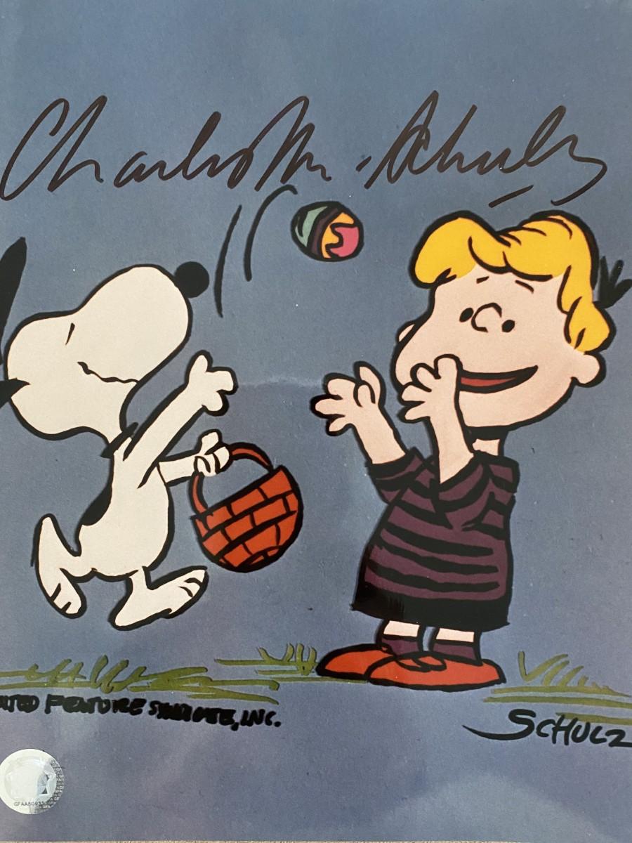 Peanuts Charles Schulz signed photo. GFA Authenticated | EstateSales.org