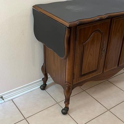 French Provincial Rolling Drop Leaf Server | EstateSales.org
