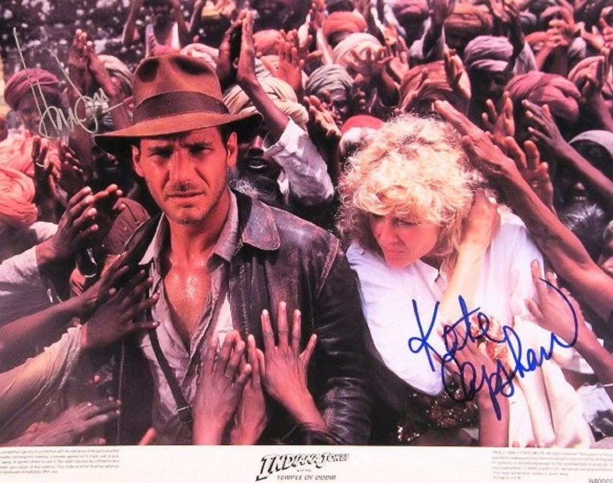 Signed Indiana Jones lobby card | EstateSales.org