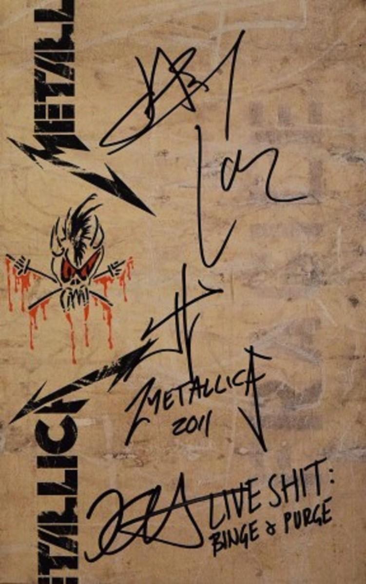 Metallica signed tour book | EstateSales.org