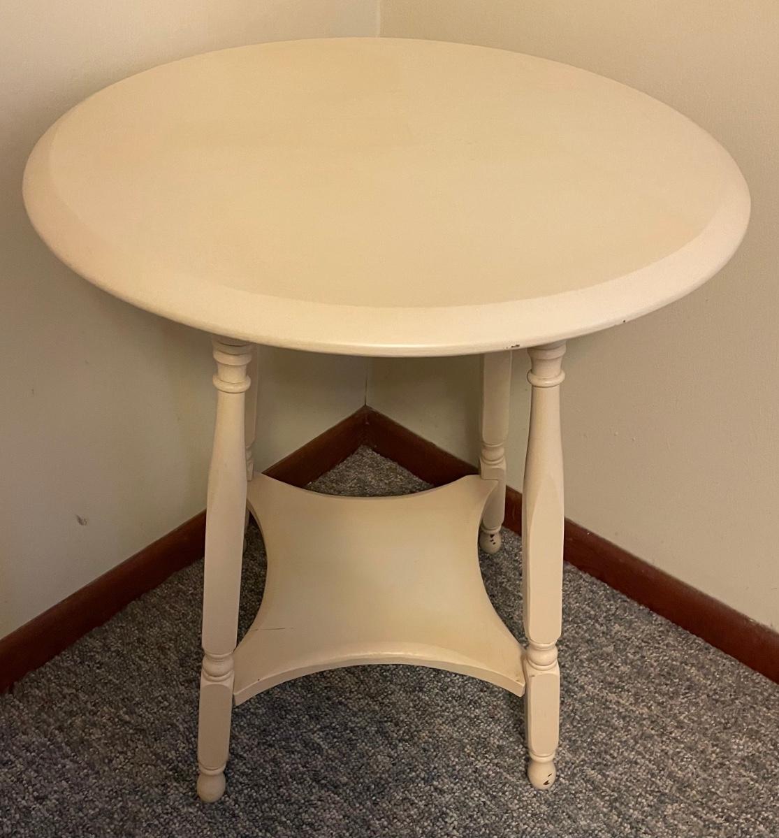 Vintage Round White Table w/splay legs and shelf | EstateSales.org