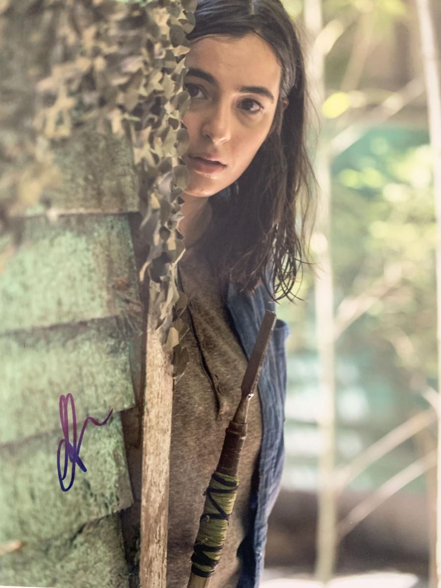 Christian Serratos signed photo | EstateSales.org
