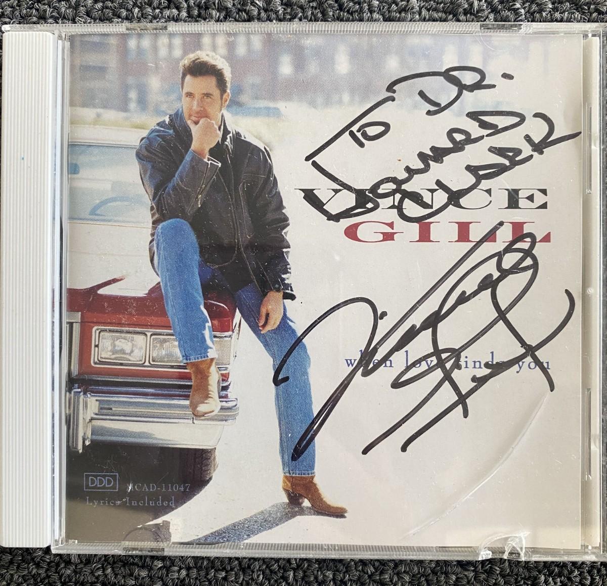 Vince Gill singed CD cover | EstateSales.org
