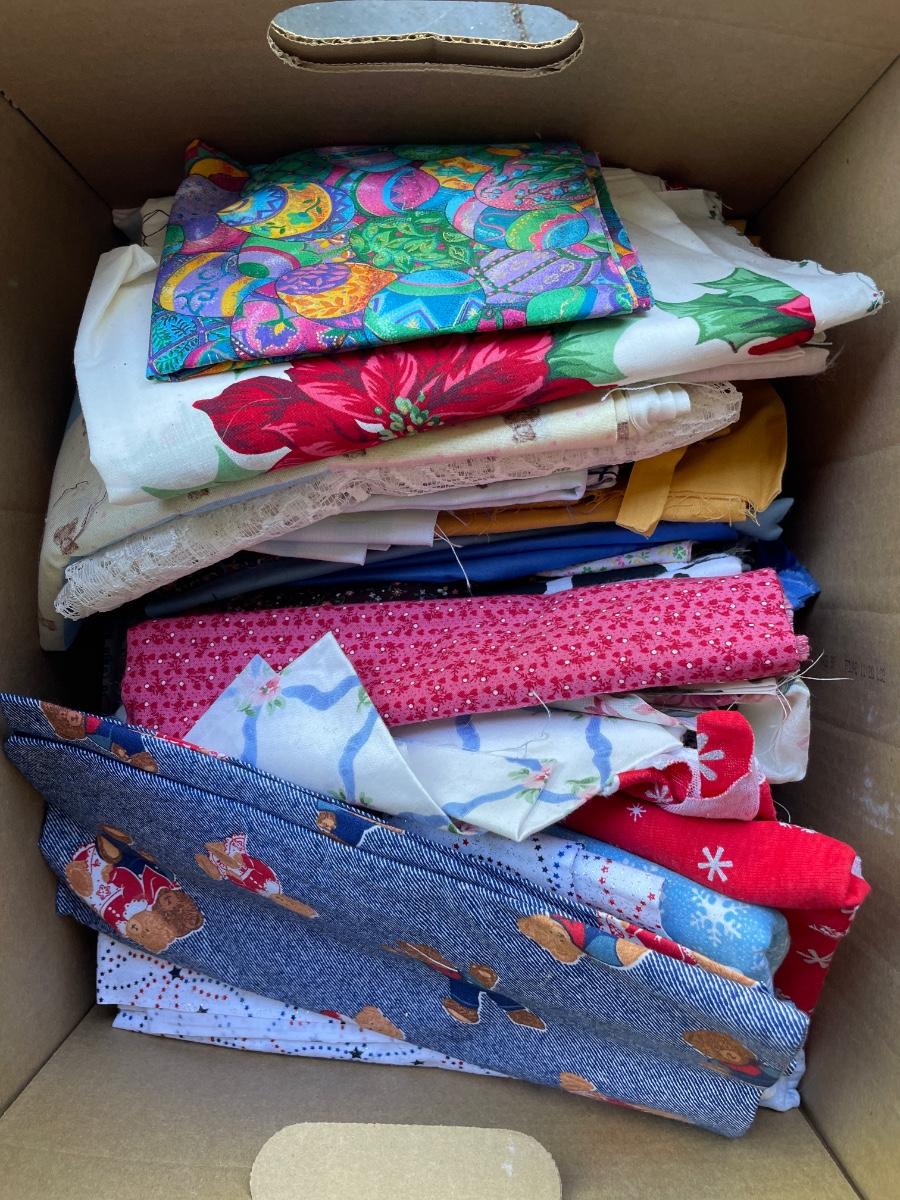 Small box of pattern material | EstateSales.org