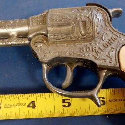 LOT 126 VERY RARE HOPALONG CASSIDY CAP GUN | EstateSales.org