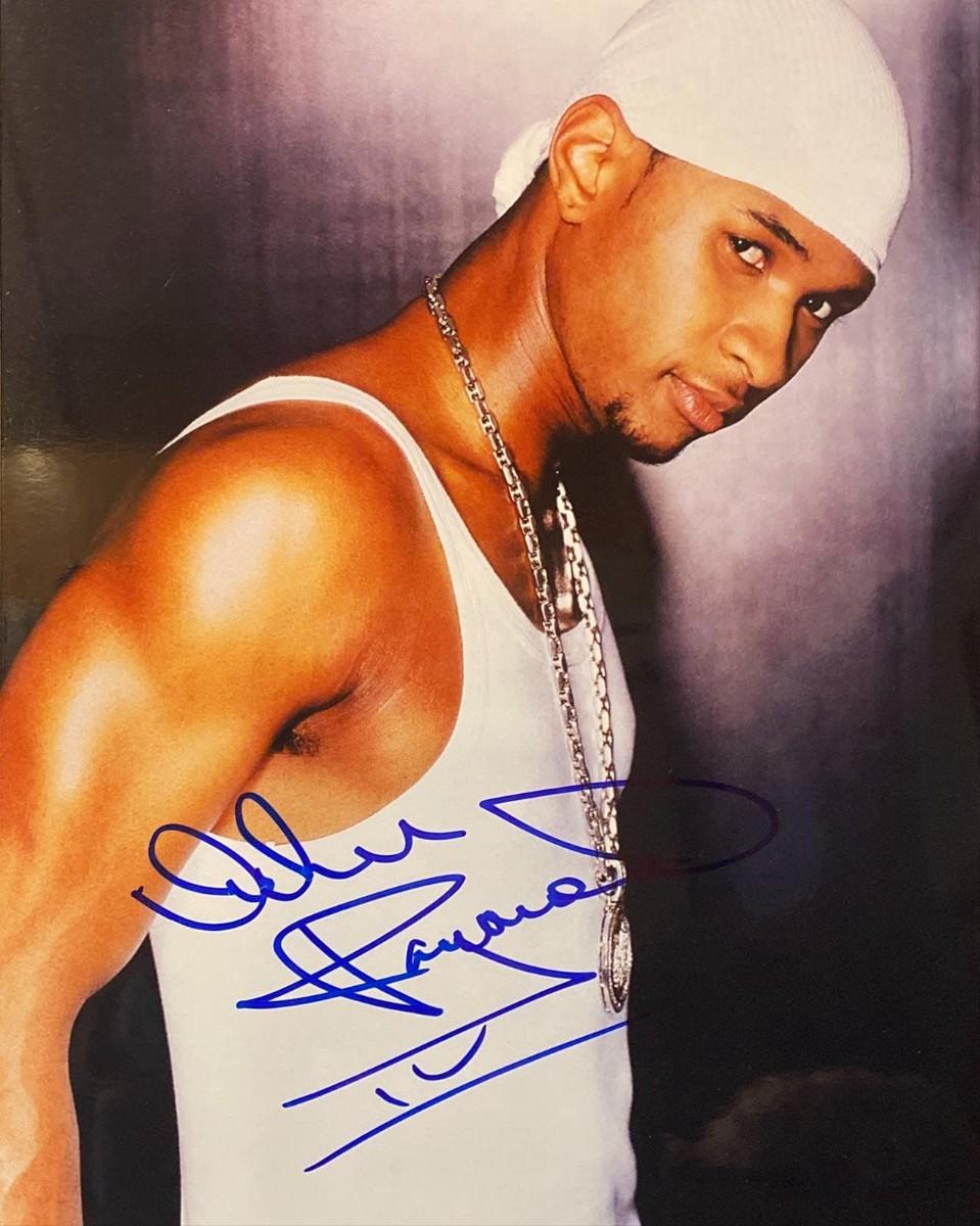 Usher signed photo | EstateSales.org