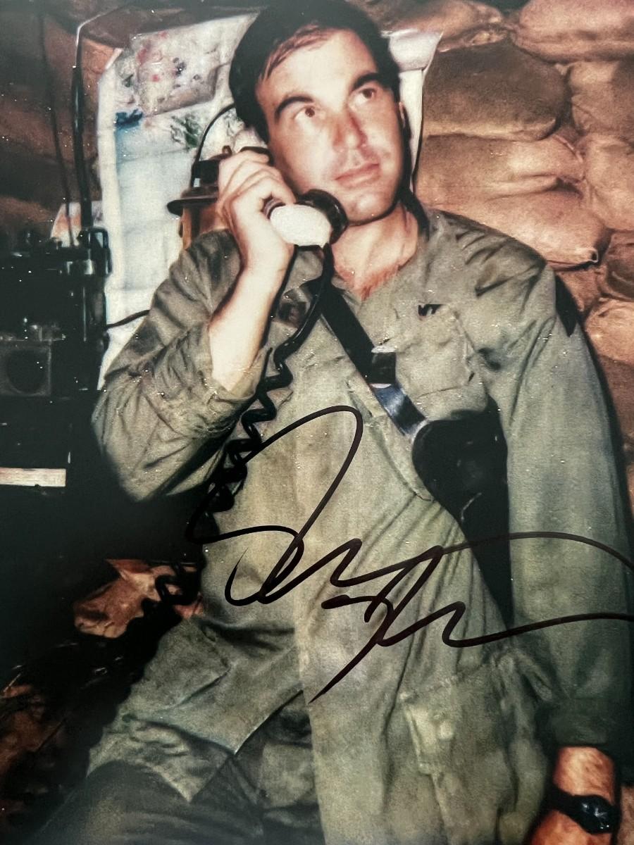 Oliver Stone signed photo | EstateSales.org