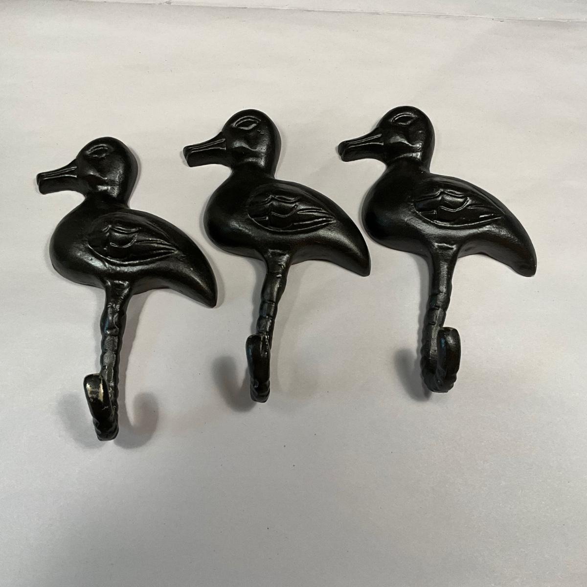 670 Set of Three Aluminum Cast Duck Wall Hooks | EstateSales.org