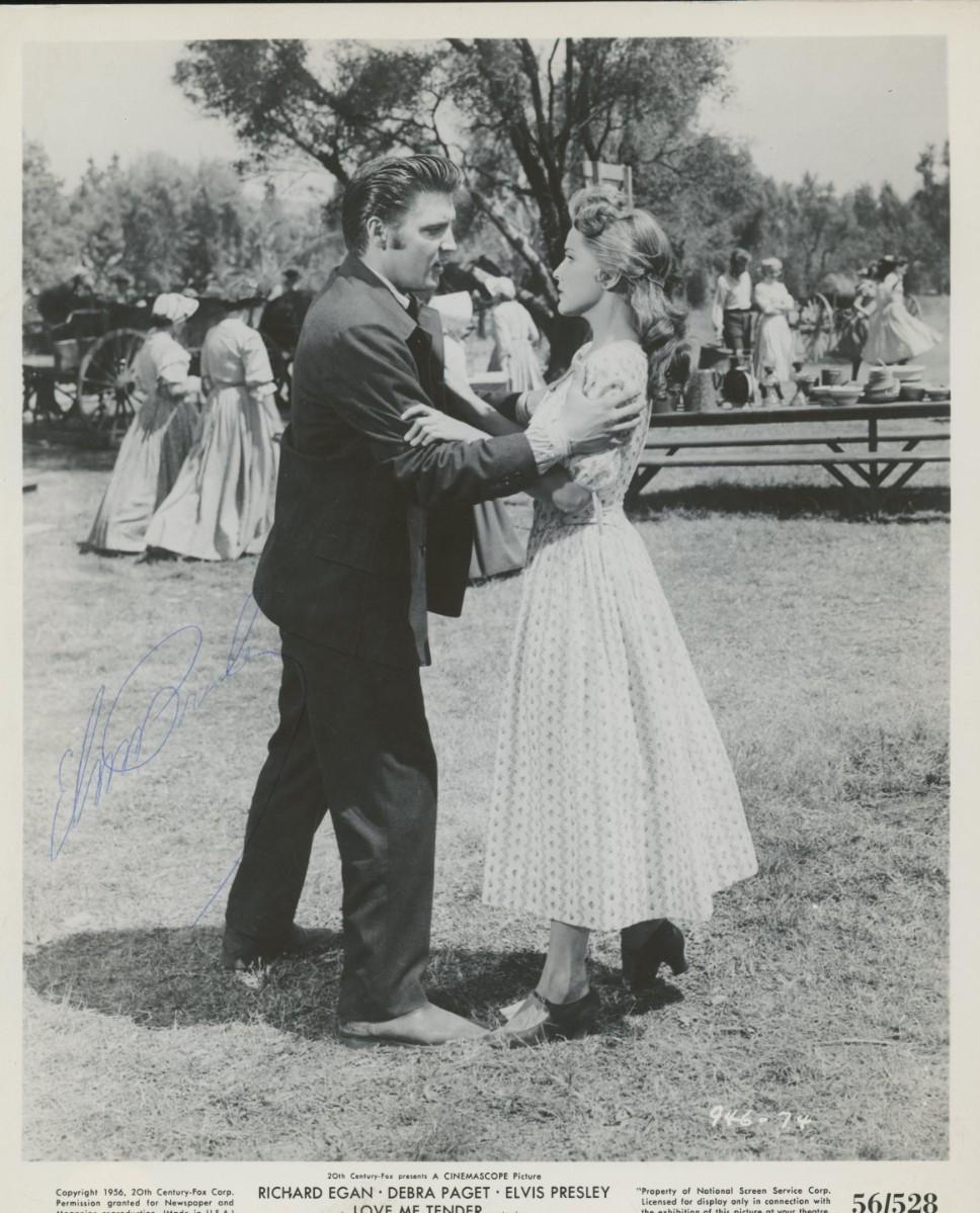 Elvis Presley signed movie photo. GFA Authenticated | EstateSales.org
