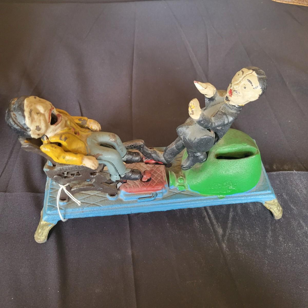 Old fashioned coin bank | EstateSales.org