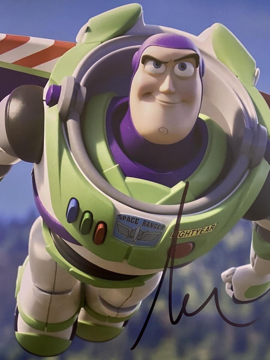 Toy Story Tim Allen signed Buzz Lightyear movie photo | EstateSales.org