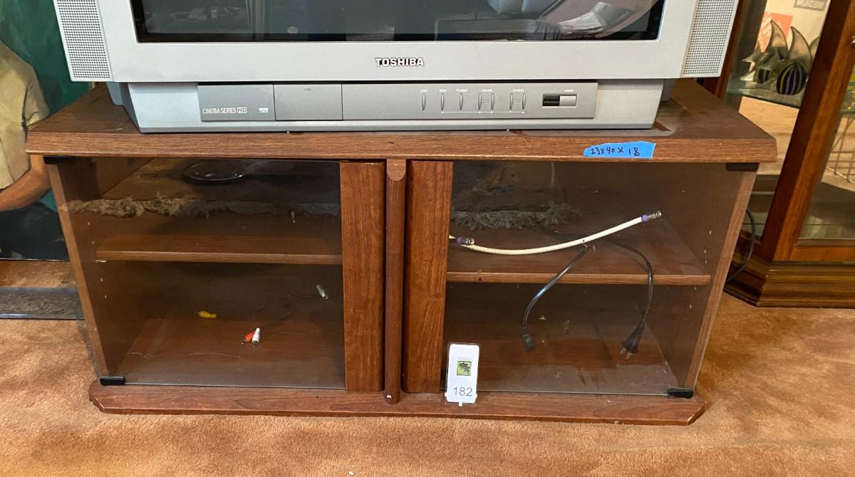 Particle board TV stand | EstateSales.org