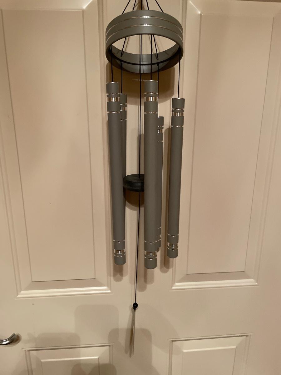 Silver wind chime | EstateSales.org