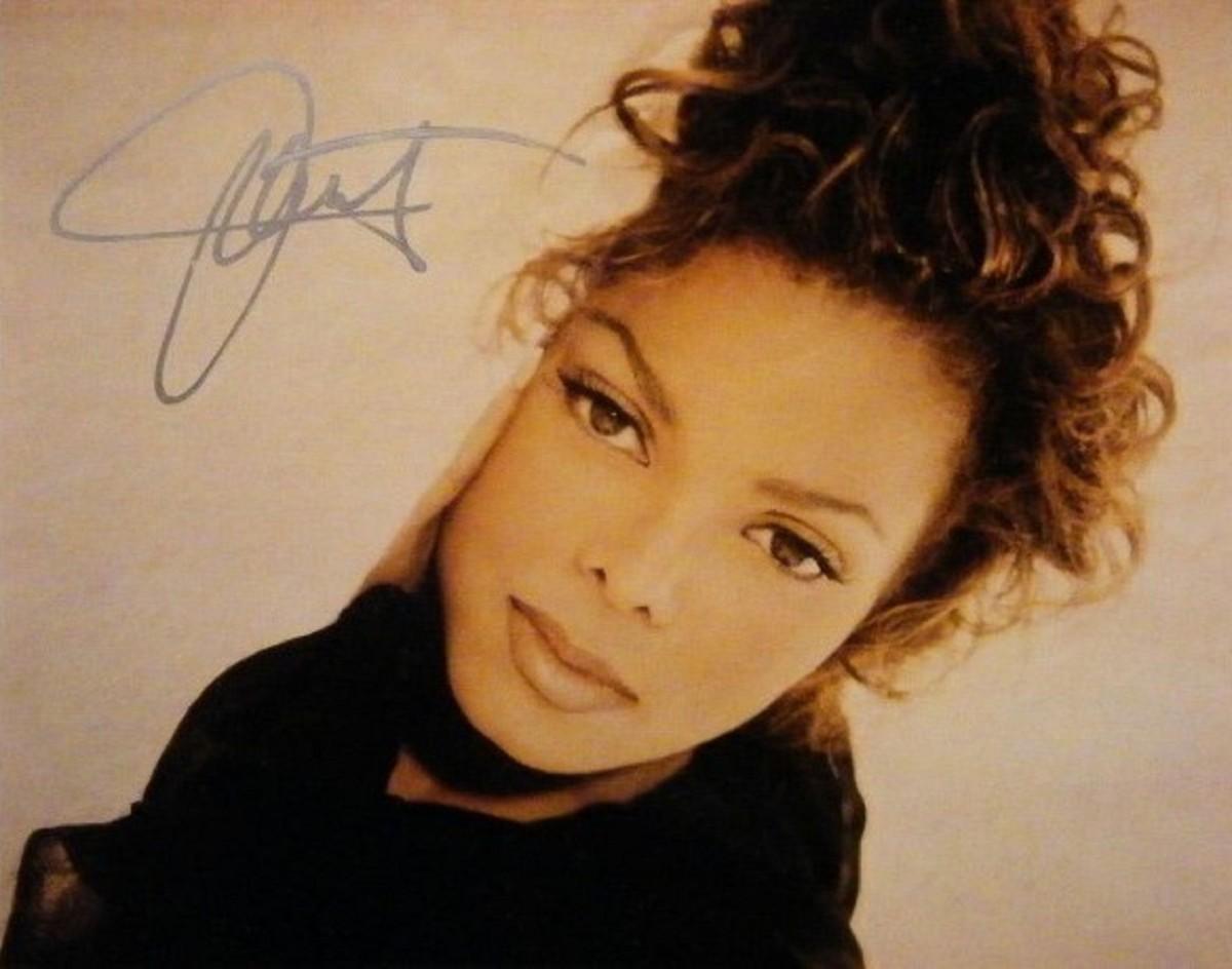 Janet Jackson signed promo photo | EstateSales.org