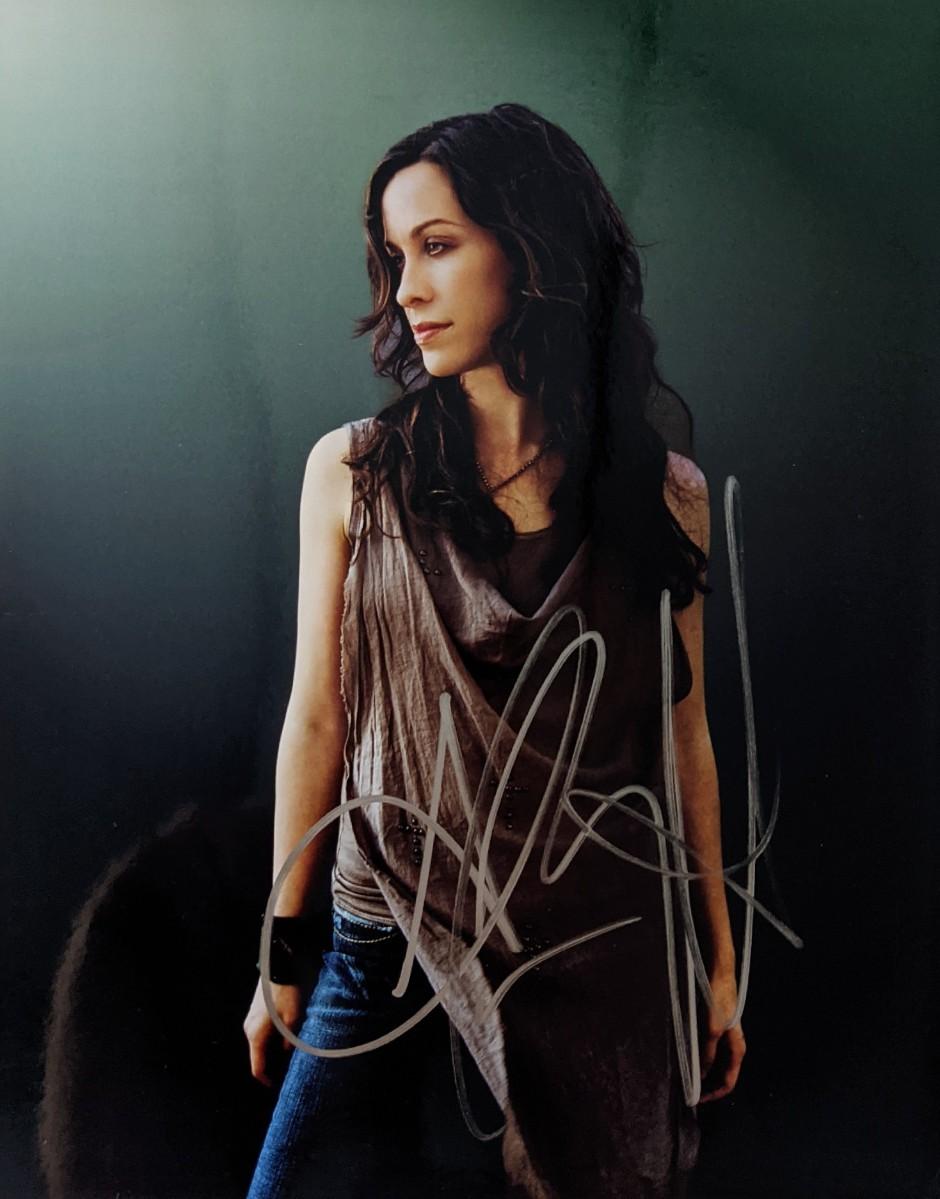 Alanis Morissette signed photo | EstateSales.org
