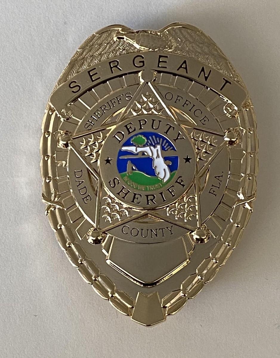 Miami Vice replica prop badge | EstateSales.org